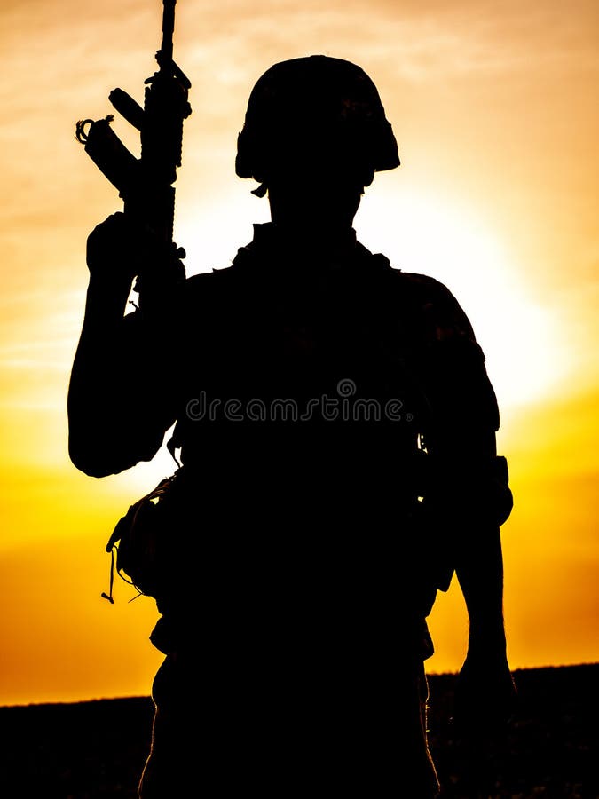 Soldier at sunset stock photo. Image of army, armed - 289908390