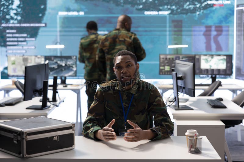 Soldier in Uniform Engages in a High Security Videoconference Call ...