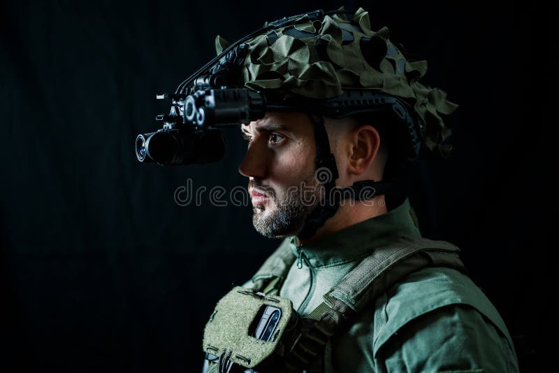 A Soldier Using Modern Binocular Night Vision in the Darkness. Close Up ...