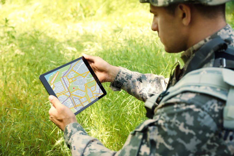 Soldier Using Tablet in Forest. Modern Technology Stock Image - Image ...