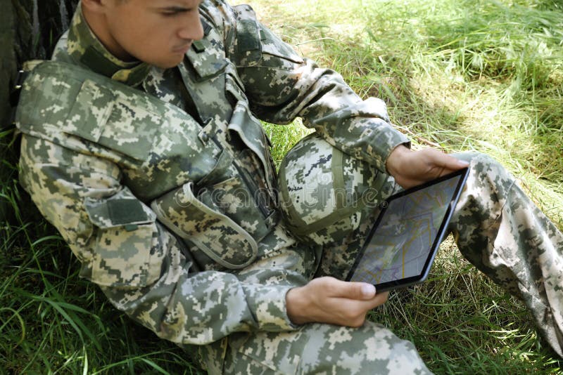 Soldier Using Tablet Near Tree Stock Image - Image of device, service ...