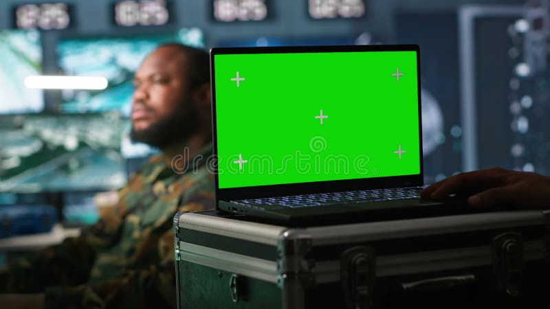 Soldier Using Tracking Software on Green Screen Laptop To Gain Info ...