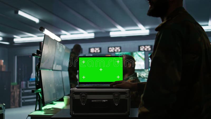 Soldier Using Tracking Software on Green Screen Laptop To Gain Info ...