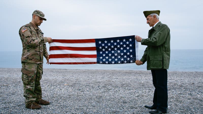 Soldier and Veteran Folding the USA Flag Together Stock Photo - Image ...