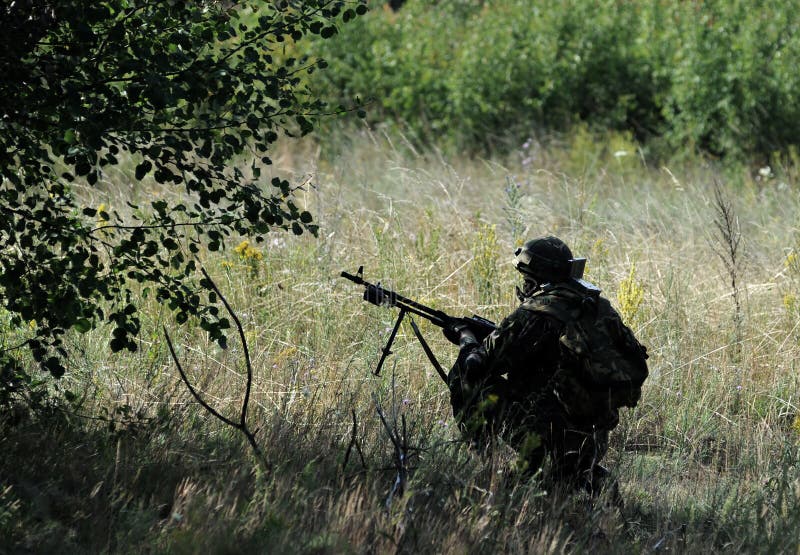Soldier with Weapon. Military Exercises, Military Operation Stock Photo ...
