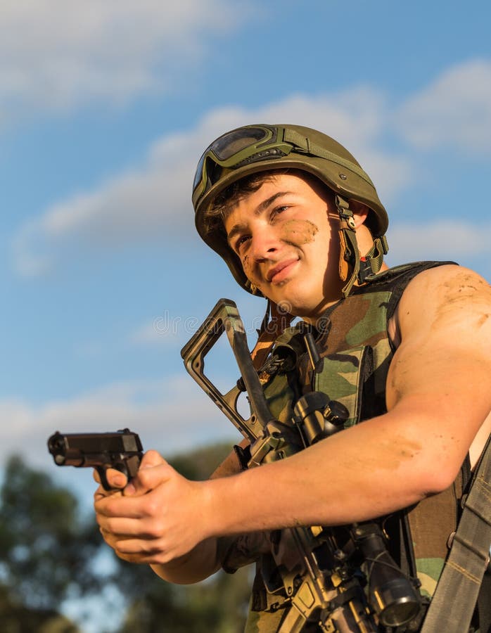 Soldier with weapon stock photo. Image of ammunition - 71179972