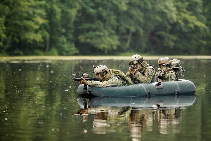 Soldiers in a Boat Sailing Ahead Stock Image - Image of looking ...