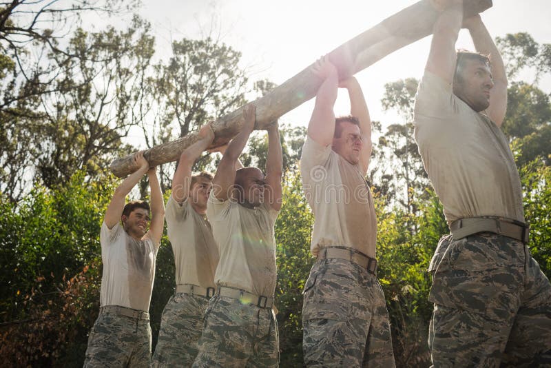 Soldiers Carrying a Tree Log Stock Image - Image of athlete, active ...