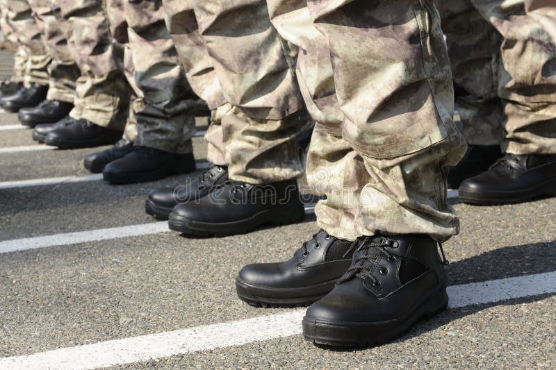 Soldiers Feet in Black Ammunition Boots Standing in a Line on the ...
