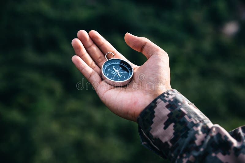 Soldiers Holding Compass for Determines the Location Stock Image ...