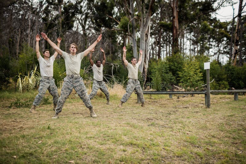 Soldiers Performing Stretching Exercise Stock Image - Image of physical ...