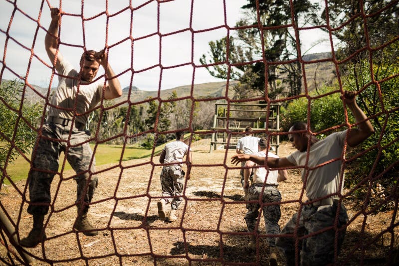 Soldiers Performing Training Exercise on Net Stock Image - Image of ...