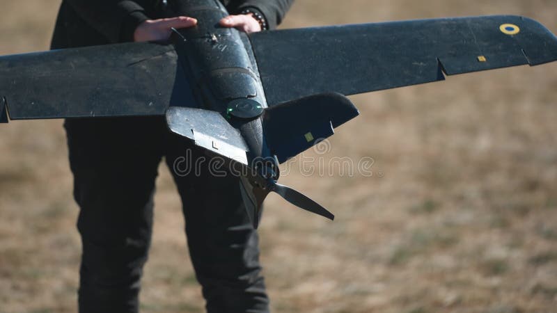 Soldiers are Preparing To Launch Drones in a Field, Testing Engine and ...