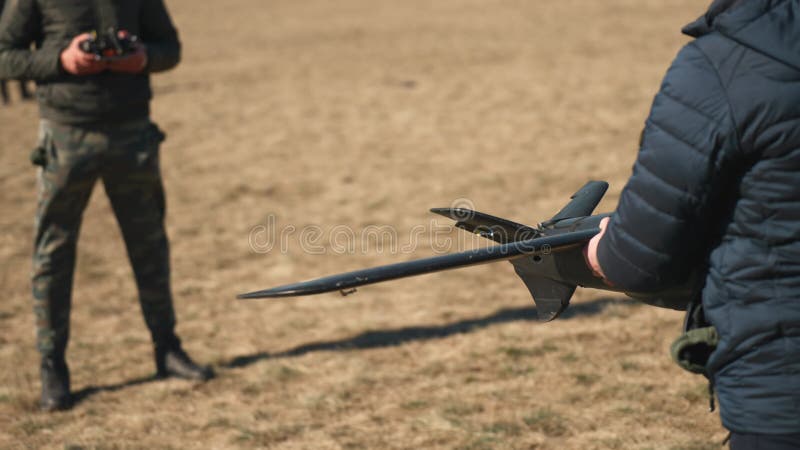 Soldiers are Preparing To Launch Drones in a Field, Testing Engine and ...