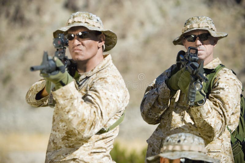 Soldiers Ready To Shoot stock photo. Image of mission - 29655838