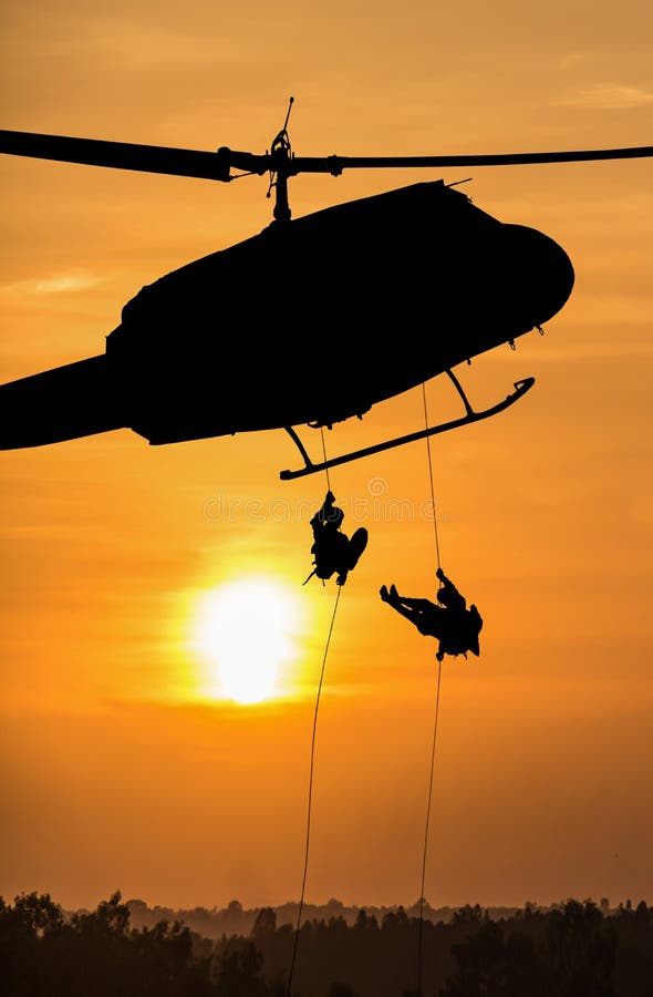 Soldier Hanging From A Helicopter Stock Image - Image of lift, machine ...