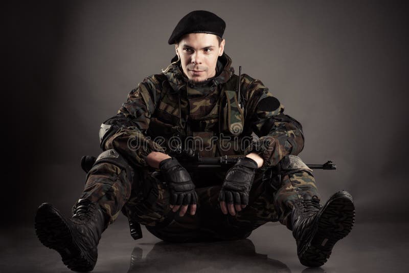 Soldiers resting stock photo. Image of beret, control - 36462466