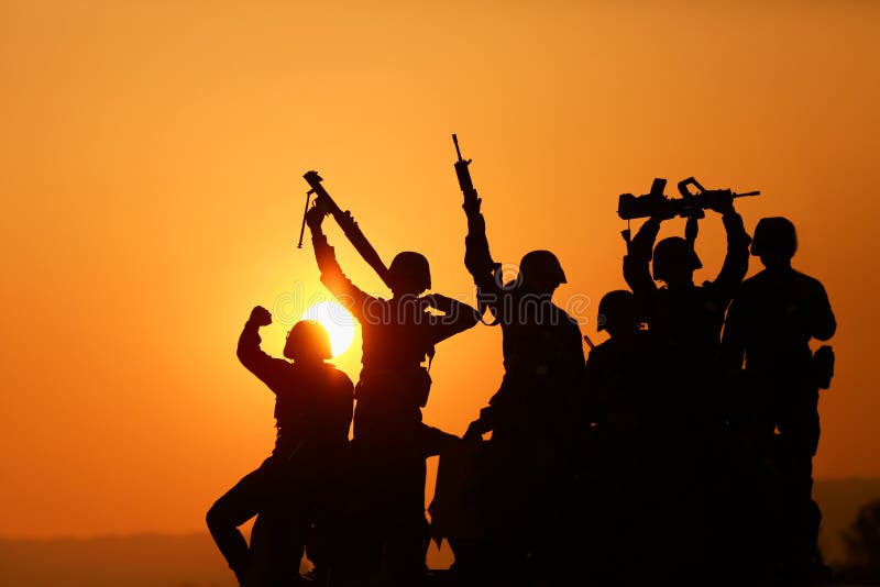 Soldiers Silhouettes Against a Sunset. Stock Photo - Image of soldier ...