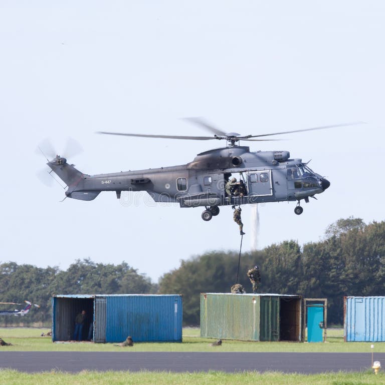 Soldiers using fast rope editorial stock image. Image of military ...
