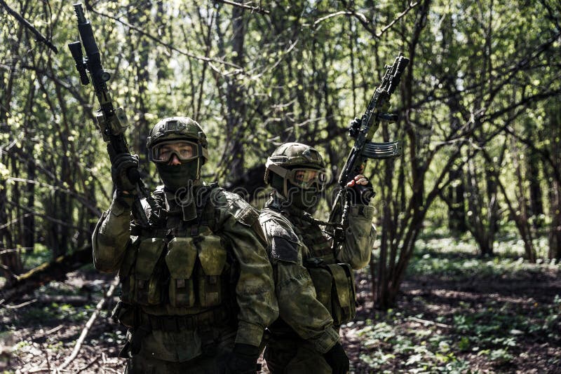 Soldiers with Weapons in Forest Stock Photo - Image of fight, campaign ...