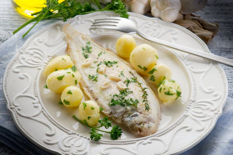 Sole fish with potatoes stock photo. Image of dinner - 17484072