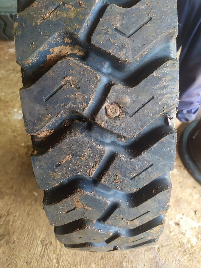 The Sole of the Tire Was Punctured by a Sharp Object Stock Photo ...