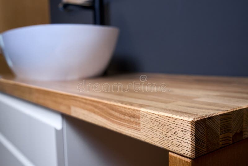 Solid Ash Glued Timber Corner Table Top Closeup. Bathroom Interior ...