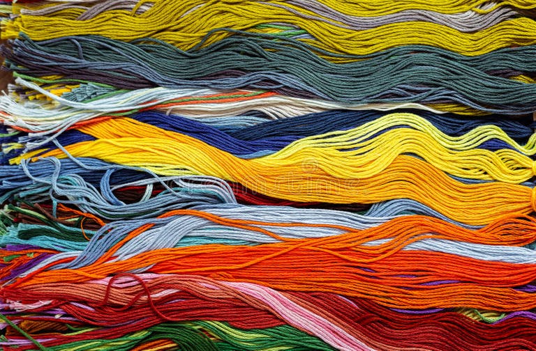 A Solid Background of Colorful Threads for Cross Stitch and Needlework ...