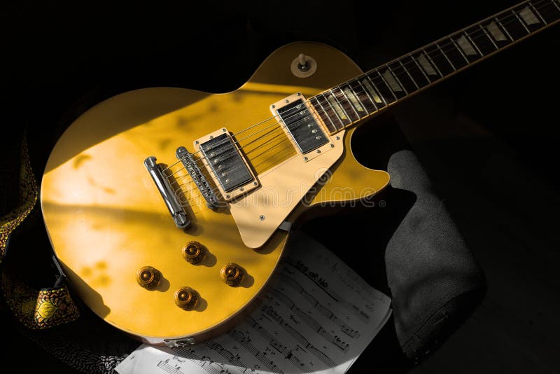 Solid Body Electric Guitar with Music Score Stock Photo - Image of ...