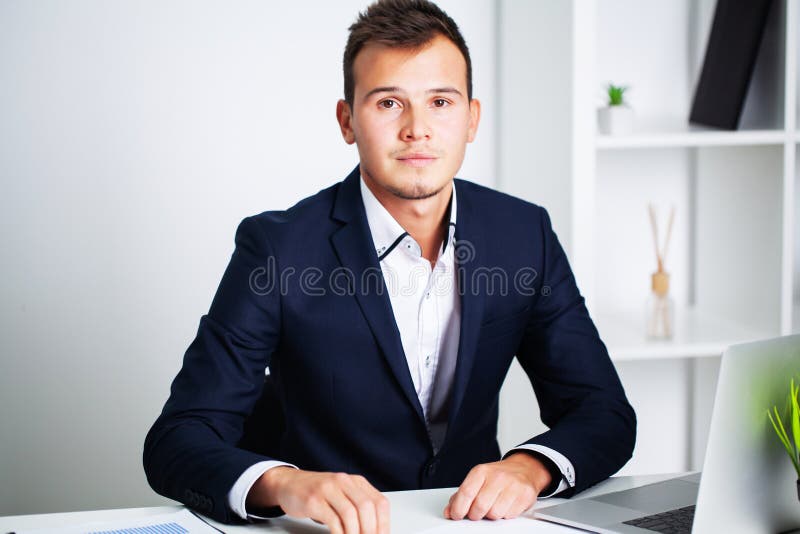 Solid Businessman in a Jacket Works in Office of Company. Stock Photo ...