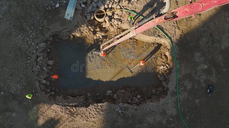 Solid Foundations: Aerial View of Concrete Pouring in Action Stock Footage - Video of office ...