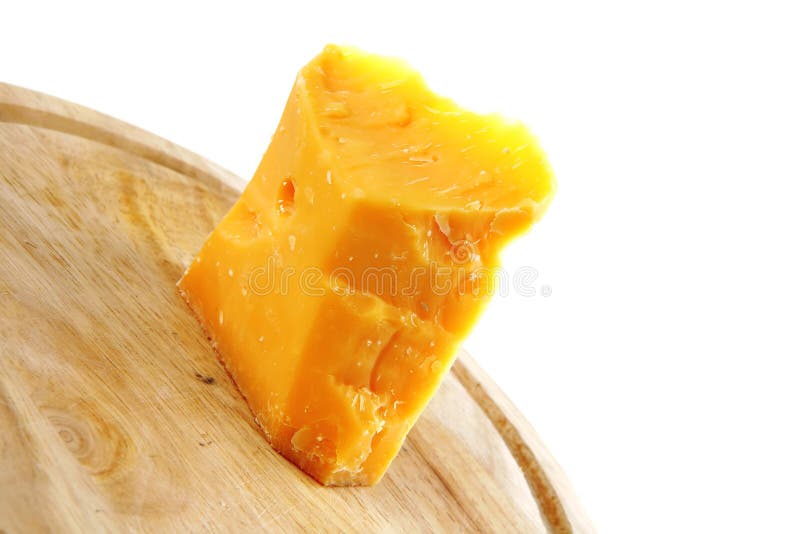Solid gauda cheese on wood stock image. Image of isolated - 14432159