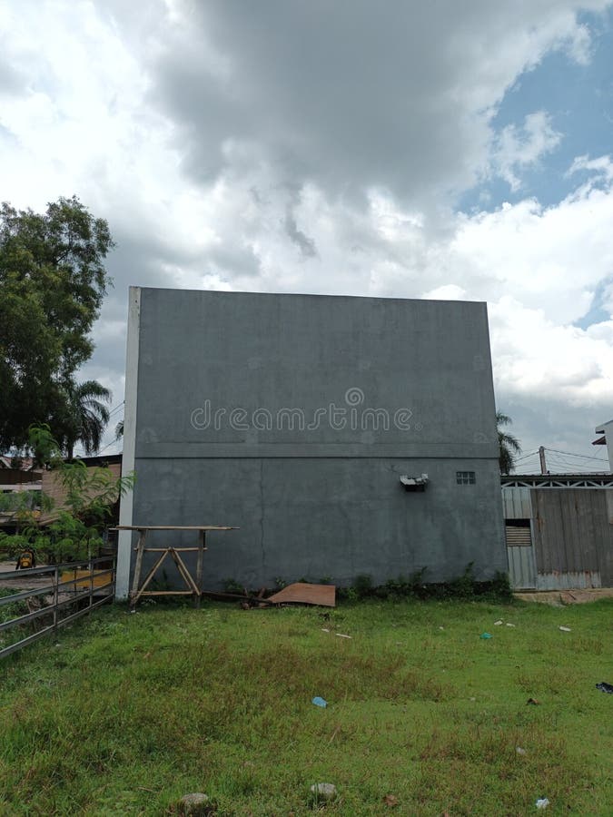 Solid Gray Wall Under a Cloudy Sky Stock Image - Image of simplicity ...