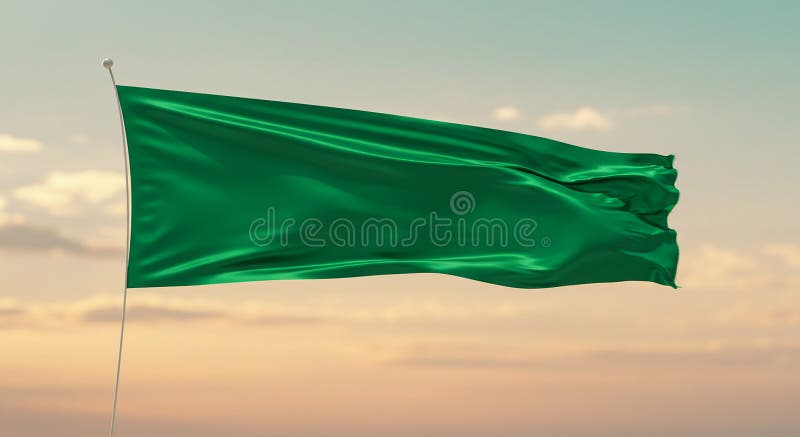 A Solid Green Flag is Waving Against a Backdrop of a Clear Sky with ...
