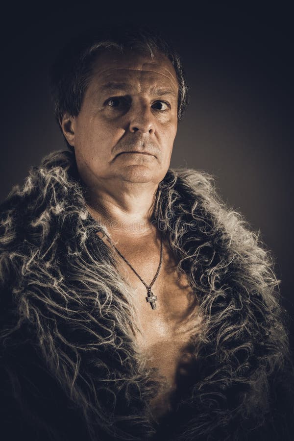 Solid Middle-aged Man in a Fur Mantle Stock Photo - Image of hunter ...
