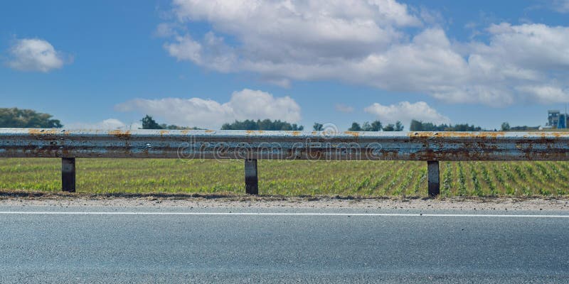 Solid Old Rusty Road Safety Rail on Highway Roadside Front View Stock ...
