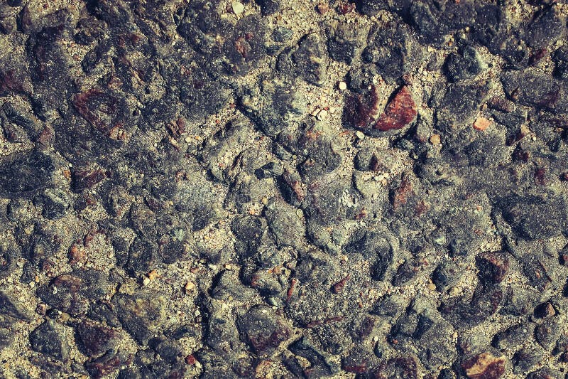 Solid Red Granite Stone is Lying on the Sand Stock Photo - Image of ...