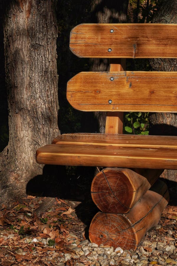 Solid Rustic Garden Bench at Sticlarie Park in Bucharest Stock Photo ...