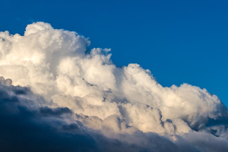 Solid White Cumulus Cloud with Dark Front Edge Stock Photo - Image of ...