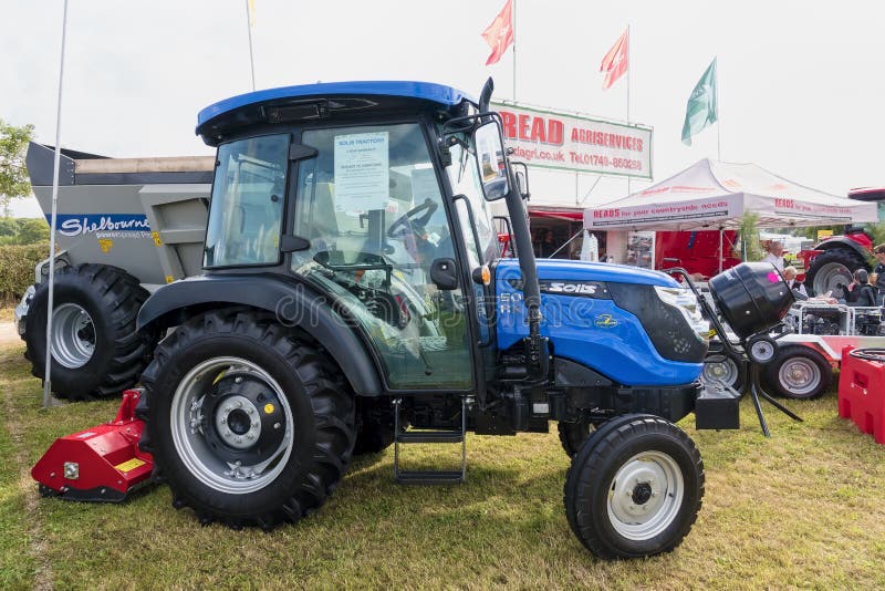 A Solis 50 HP 2WD Tractor editorial photography. Image of cheese ...