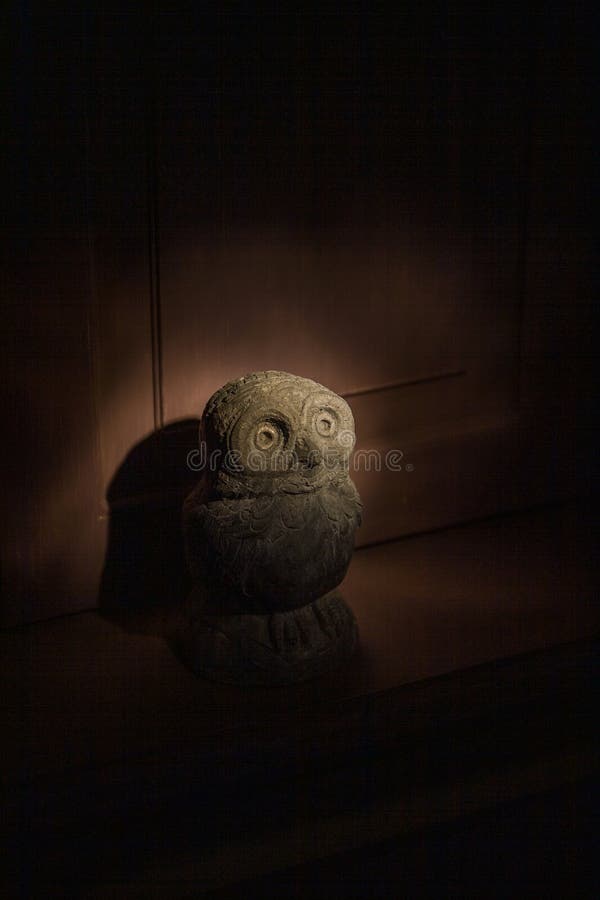 Solitary Owl Sculpture in Spotlight Stock Photo - Image of creature ...
