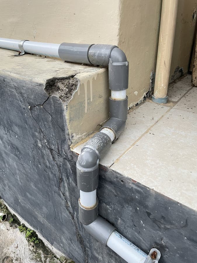 Water Pipe Connection in the Corner of the Building Stock Image - Image ...