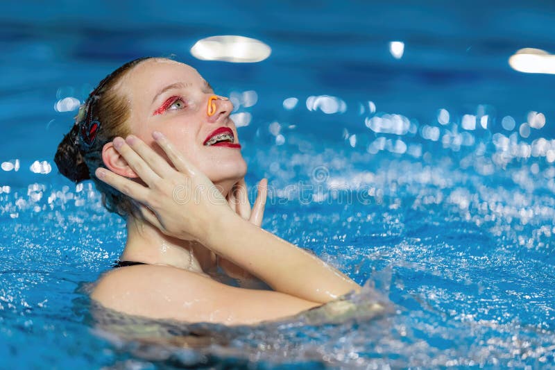 Solo Synchronized Swimming Performance, Showcasing Aquatic Artistry and ...