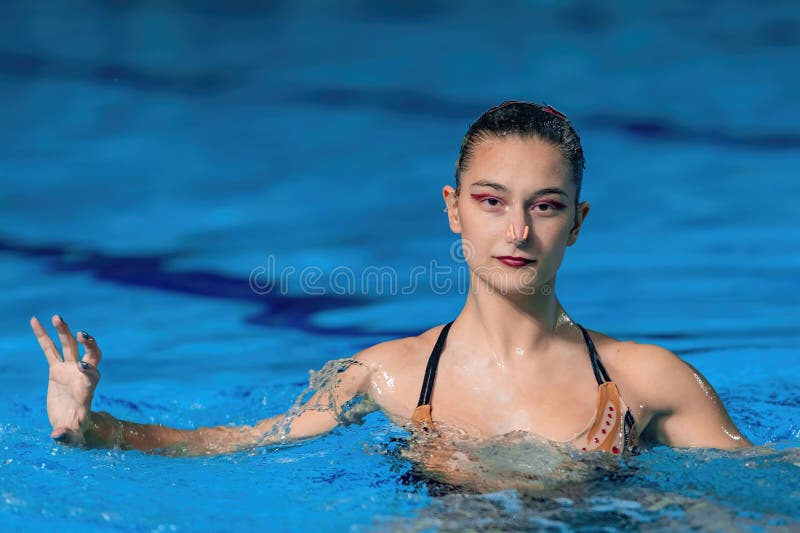 Solo Synchronized Swimming Performance, Showcasing Aquatic Artistry and ...