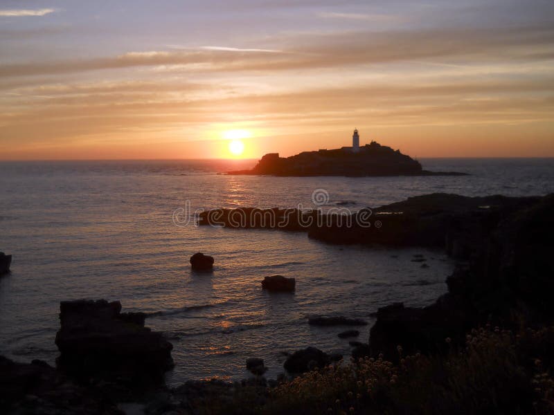 Solstice Sunset stock image. Image of island, lighthouse - 42100143