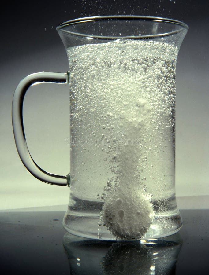 Soluble tablet in a glass stock image. Image of tablet - 82877191