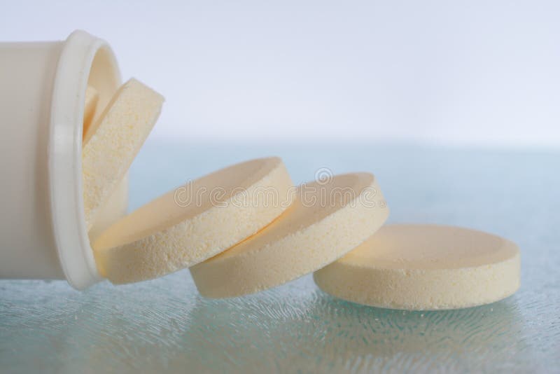 Tablets Falling Down on Blue Background Stock Photo - Image of falling ... Tablets Falling Down on Blue Background Stock Photo - Image of falling ...