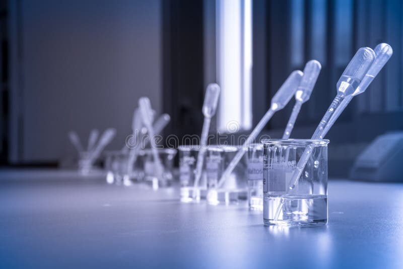 Solution in Beakers with Dropper Stock Photo - Image of laboratory ...