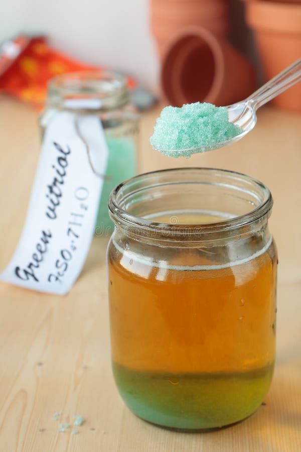 Solution of Iron Sulphate in Jar Stock Photo - Image of solution ...