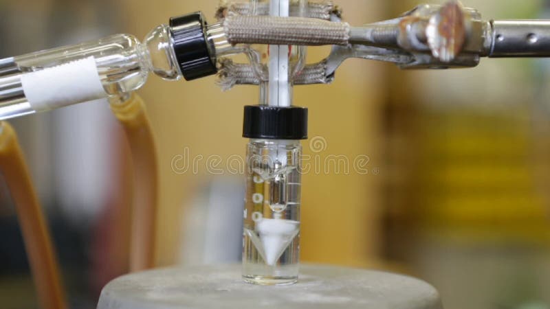 Solution mixing in a flask stock video. Video of bottom - 238078705